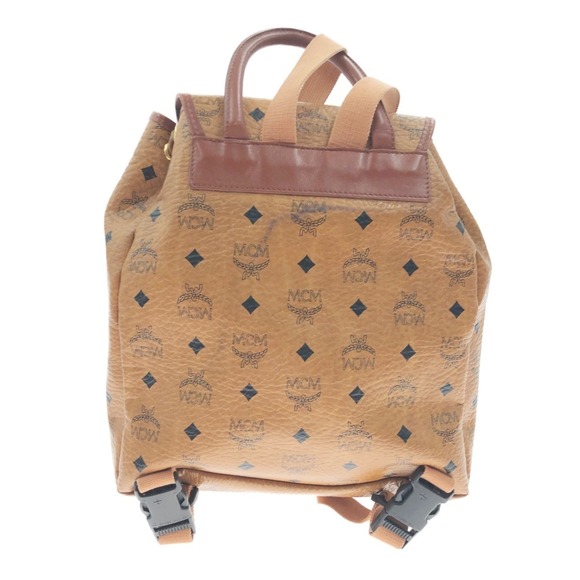 MCM | Bags | Mcm Heart Backpack Plate Brown | Poshmark
